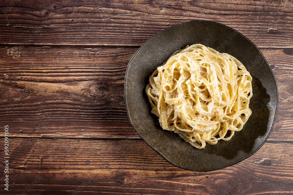 Delicious fettuccine pasta with white cheese sauce. Fettuccine pasta ...
