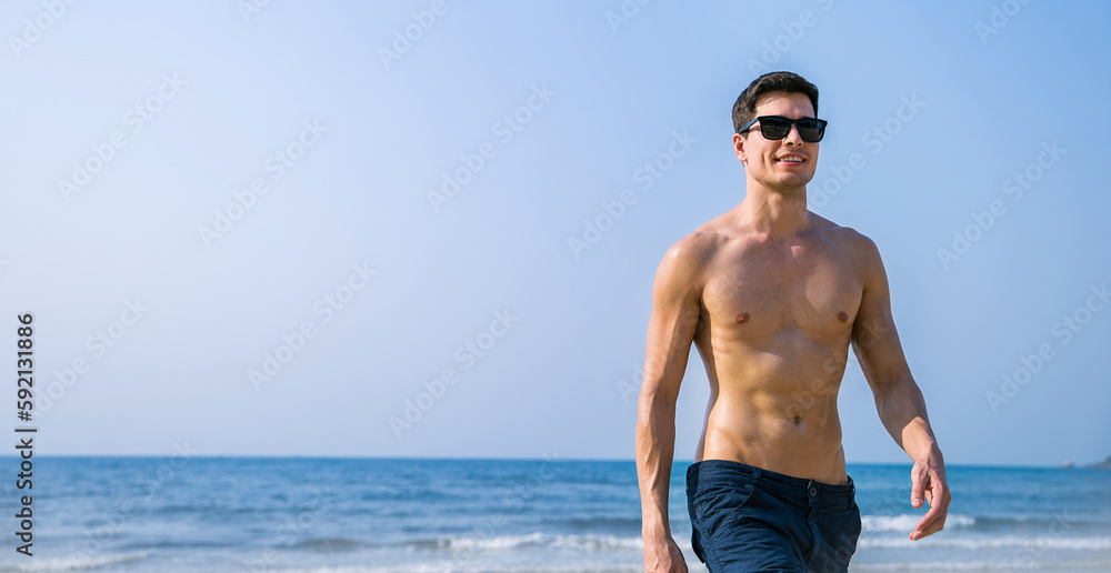 Portrait of handsome sexy caucasian man on the beach. Young healthy ...