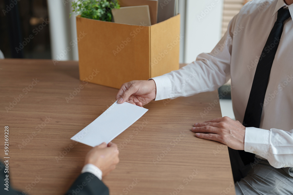 Resignation. Business people breaking the contract with resignation ...