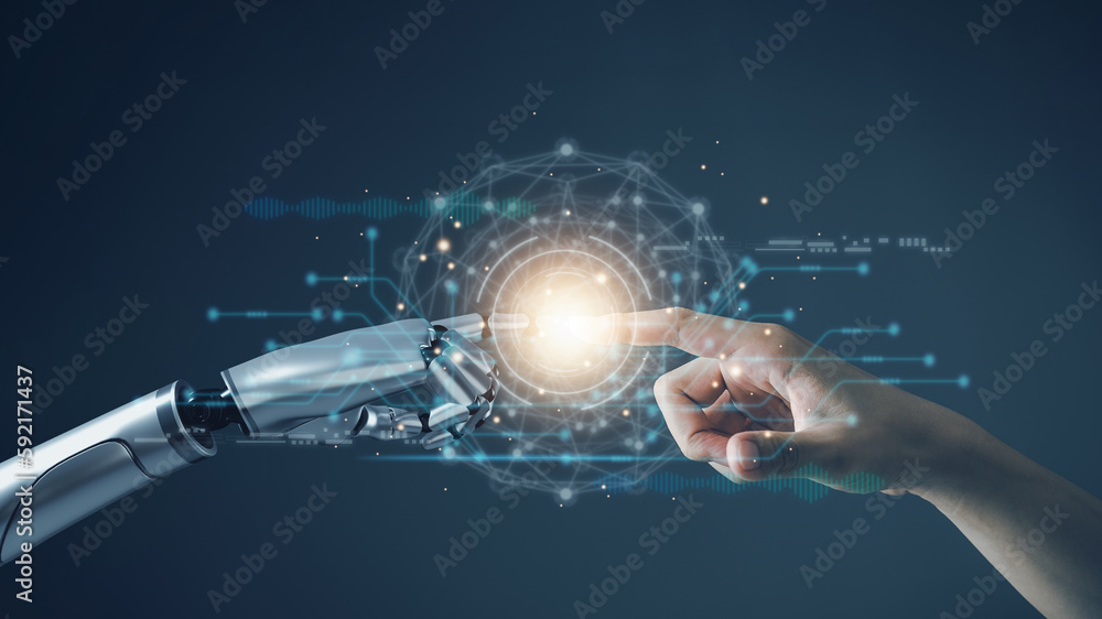 AI technology concept, Machine Learning, Robot hand touching human hand ...