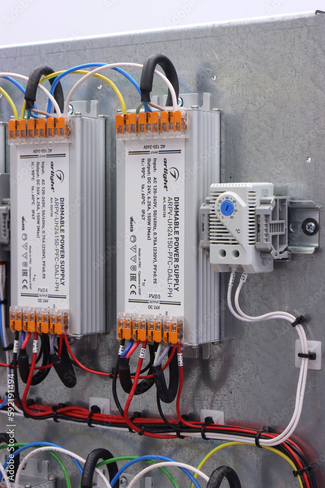 Metal panel with installed Arlight power supplies for dimming lighting ...