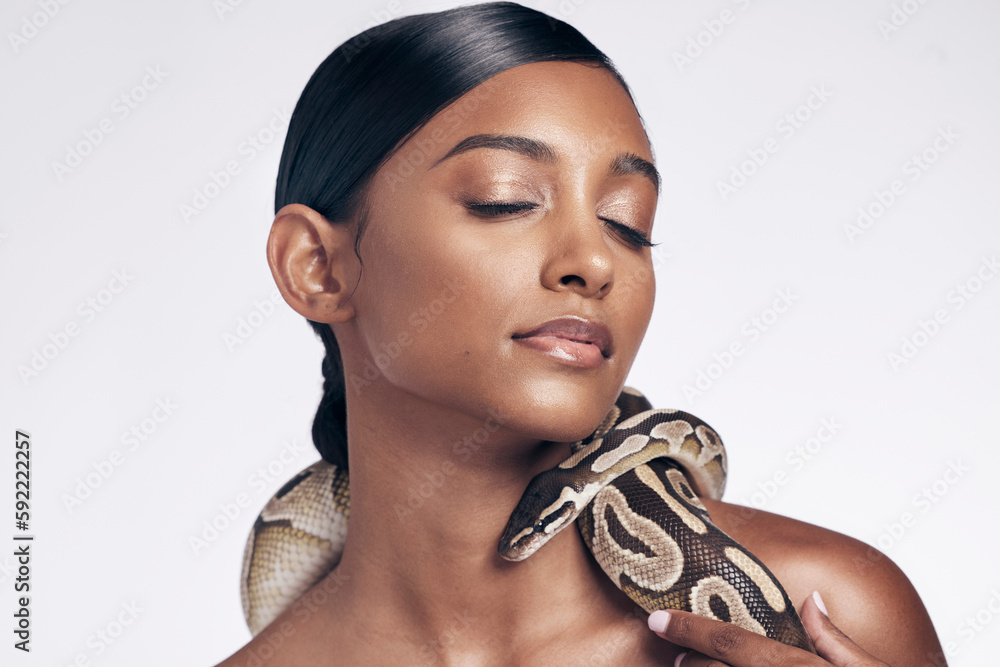 Skincare, studio and woman with snake on neck for art aesthetic with ...
