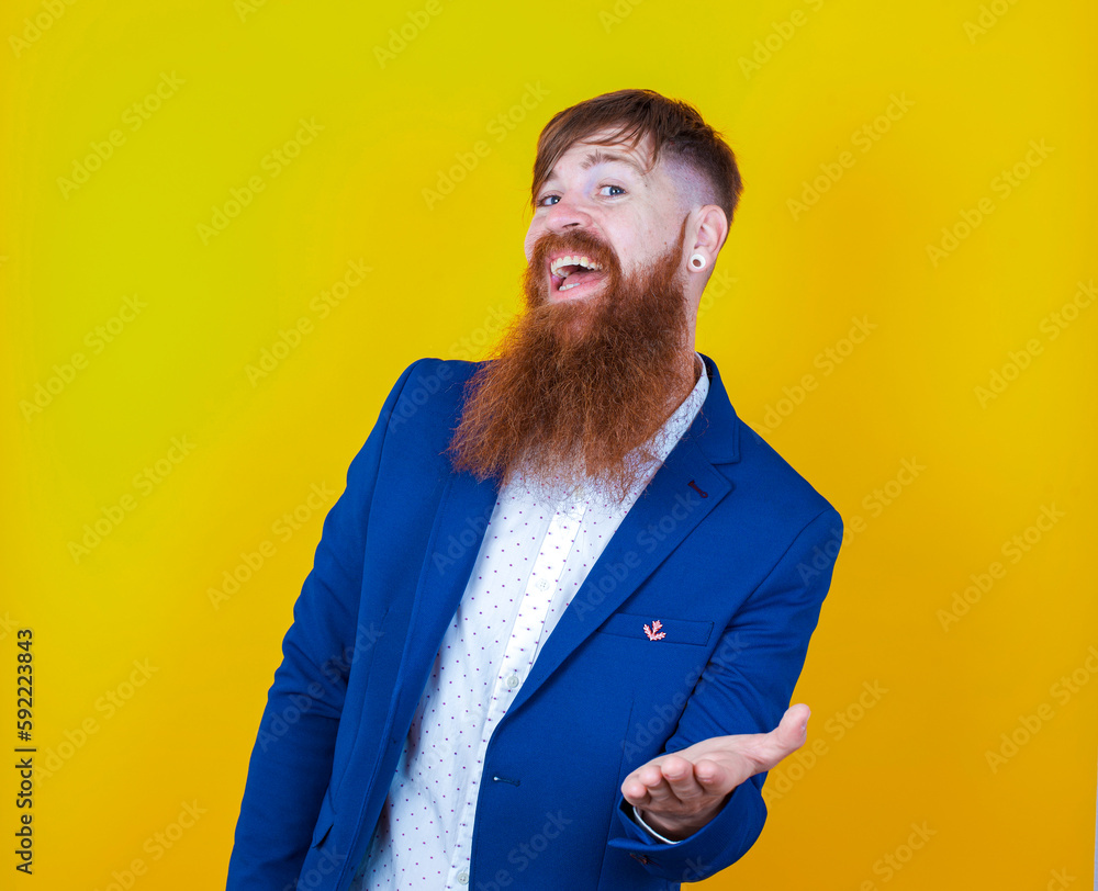 red haired man wearing blue suit over yellow studio background smiling ...