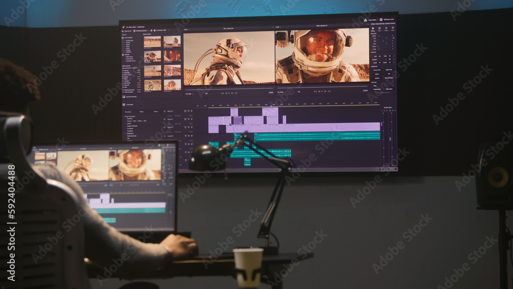 Foto de African American colorist makes color grading in video editing ...