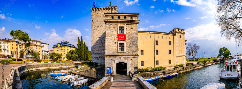 Fotka „Riva del Garda, Italy - March 20: historic buildings at the old ...