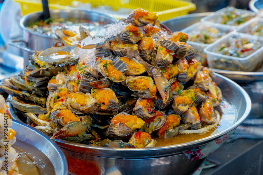 Staked of fish sauce-fermented sea crab in the try on seafood market ...