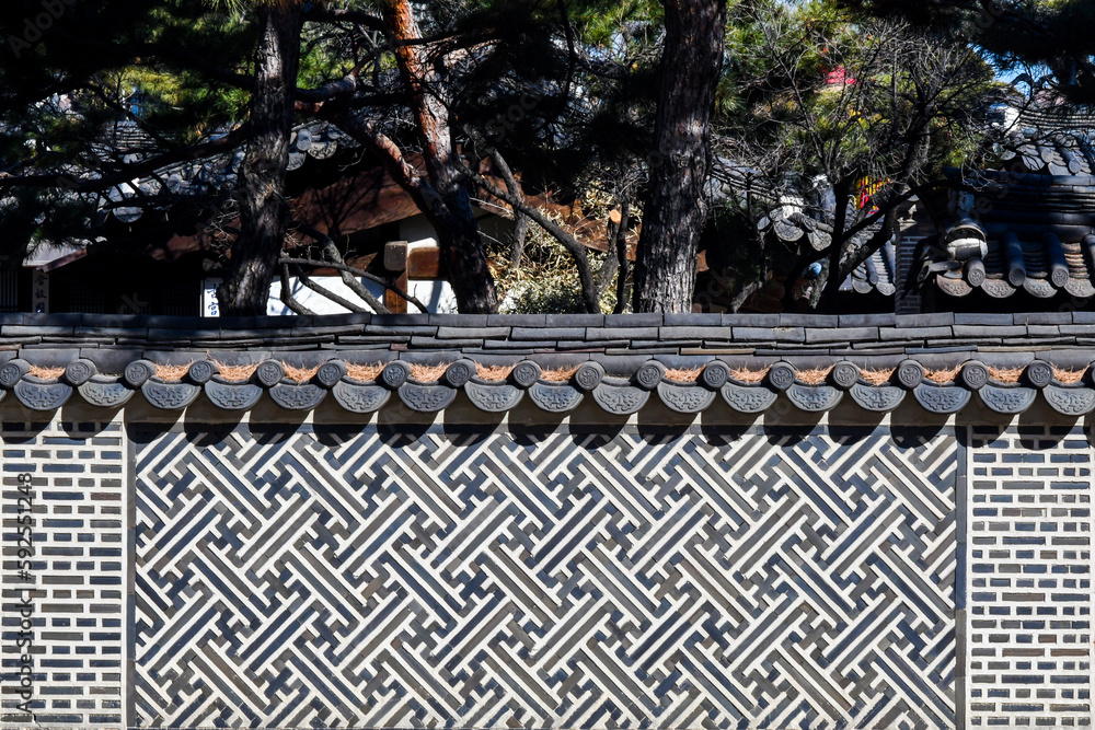 Brick wall background with traditional Korean patterns Stock Photo ...