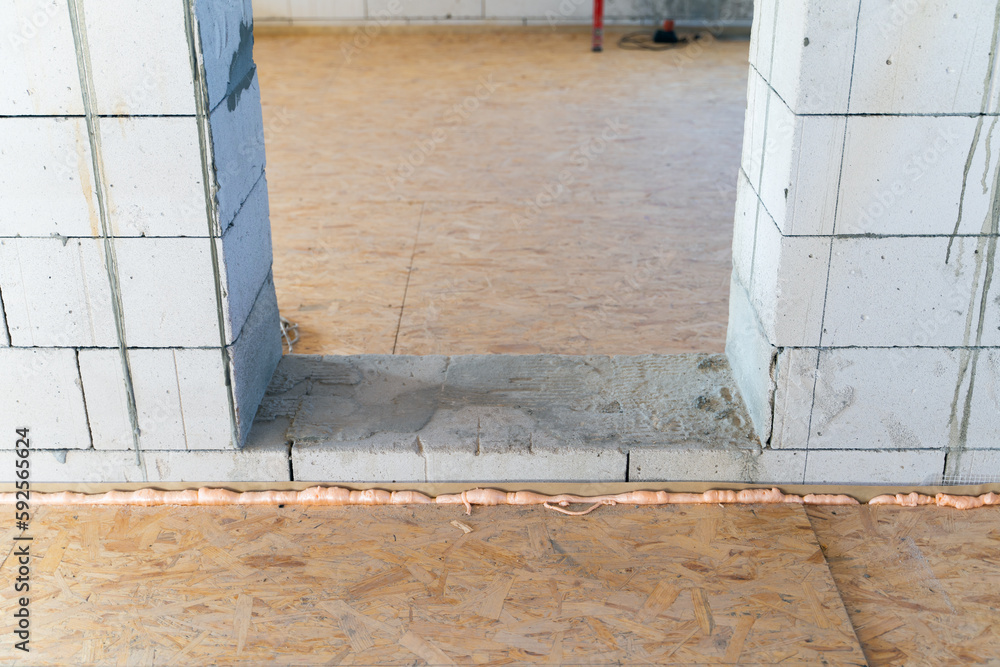 Doorway in the wall of the gas block. High threshold between rooms ...