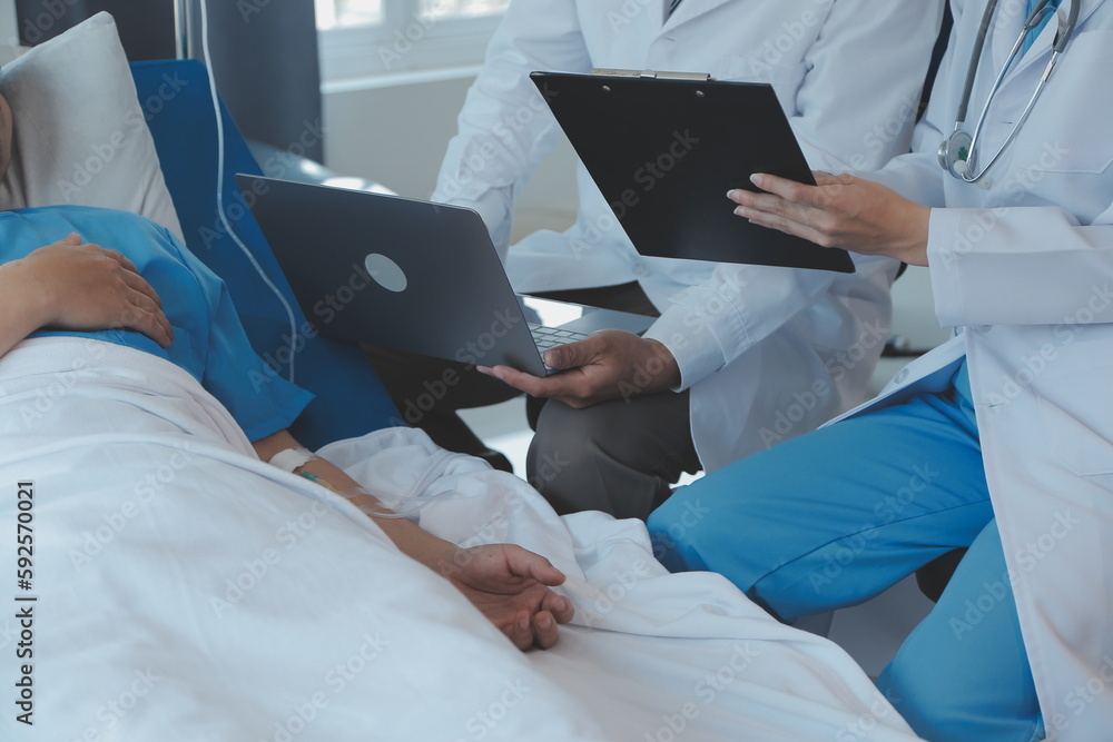 Injured patient showing doctor broken wrist and arm with bandage in ...
