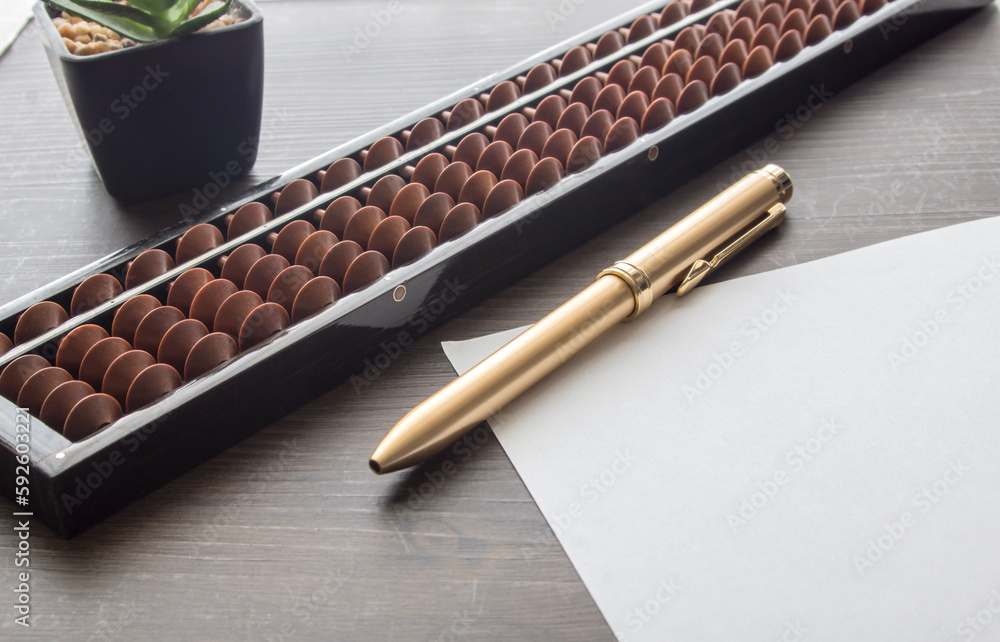 Japanese abacus and pen on the desk. background image. soroban . first ...