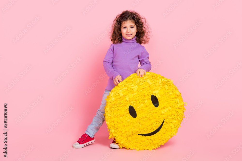Full length photo of good mood small kid wear violet sweater holding ...