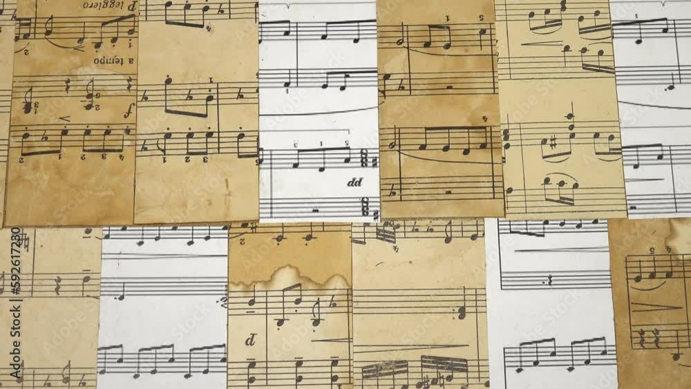 A collage from various old parts of old sheets music on cardboard ...