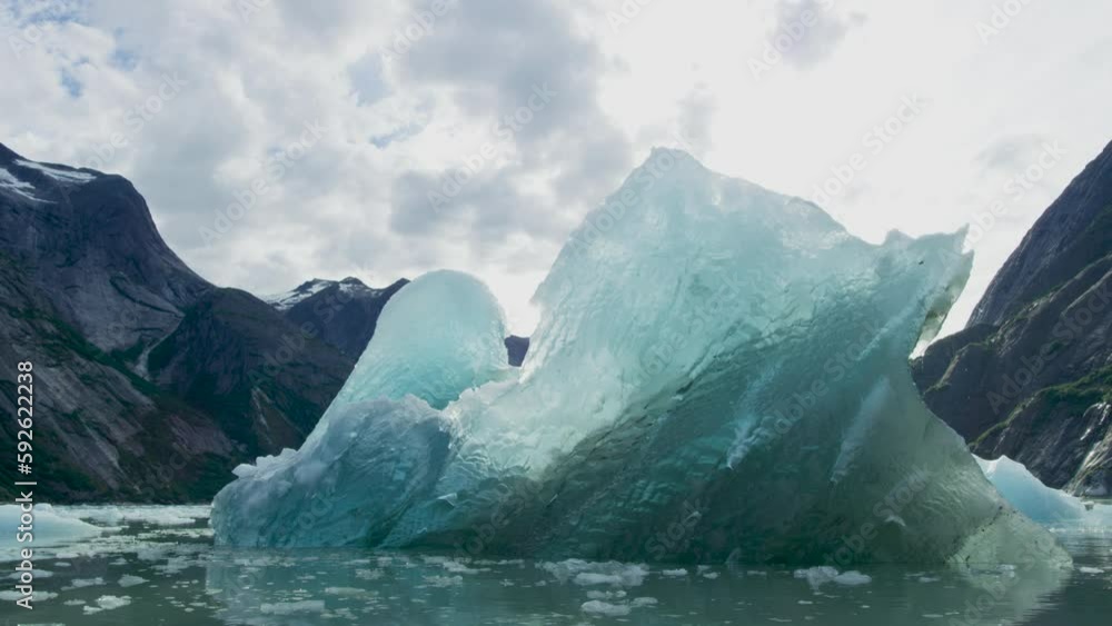 Watch the ice floes and icebergs on the river in a small boat. Rocks ...