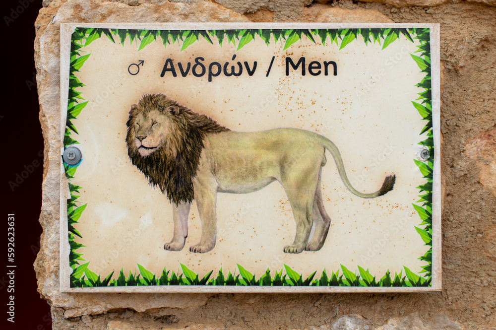 Toilet sign of a lion for a men restroom in a Greece zoo. Stock Photo ...