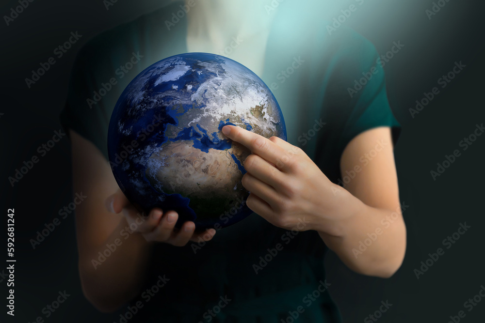 Human holds Earth planet globe. Symbolizing global unity, environmental ...