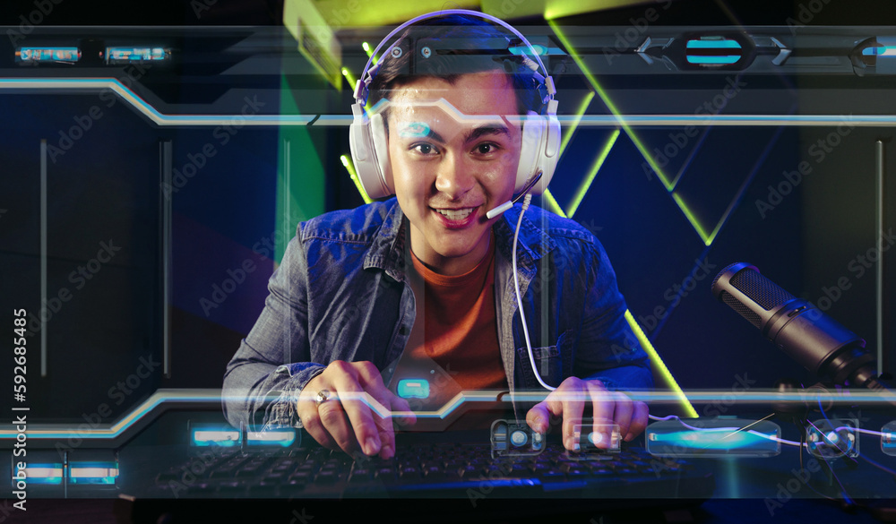 Engaged in an exciting first person shooter video game, a male gamer ...