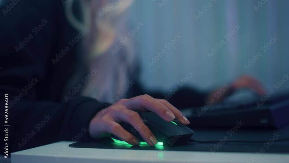 Close up of Woman Gamer Hands using computer mouse and typing, pushing ...