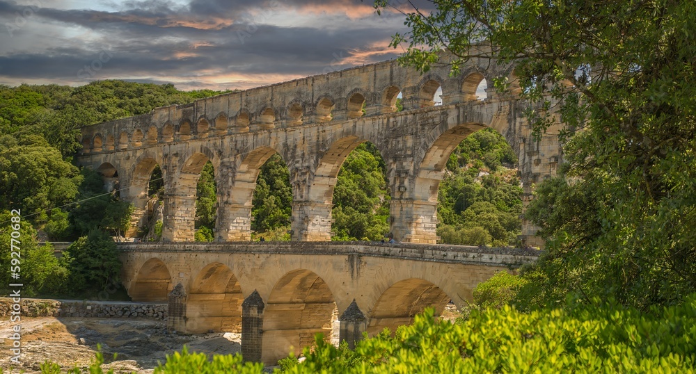 Poster Pont du Gard, a Mighty aqueduct bridge rising over 3 well ...