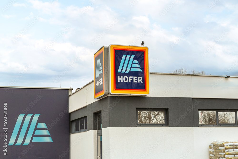 Graz, Austria - April 01th 2023: Branch logo sign of a Hofer filiale, a ...