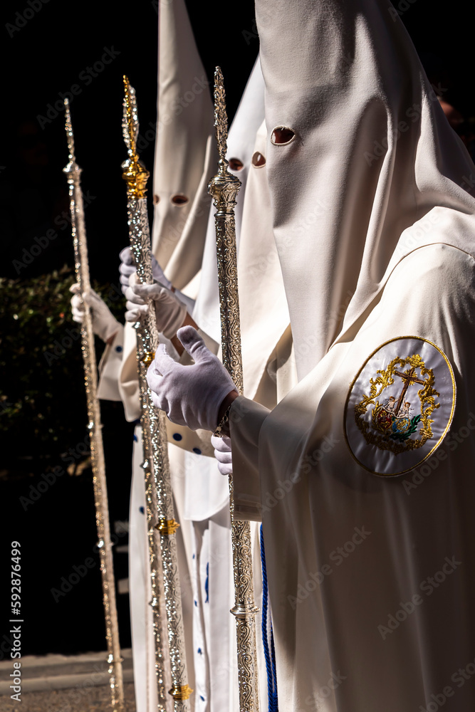 Penitent with staff of silver during a procession of holy week on Palm ...