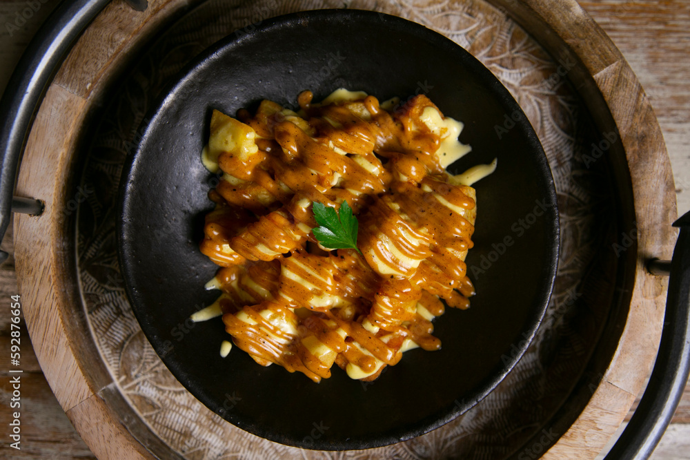 Papas bravas, are a typical preparation of bars in Spain consisting of ...