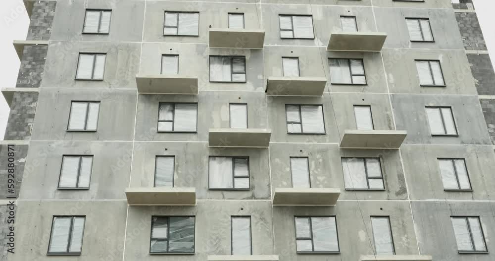 Stages of construction of an apartment building. A newly built ...