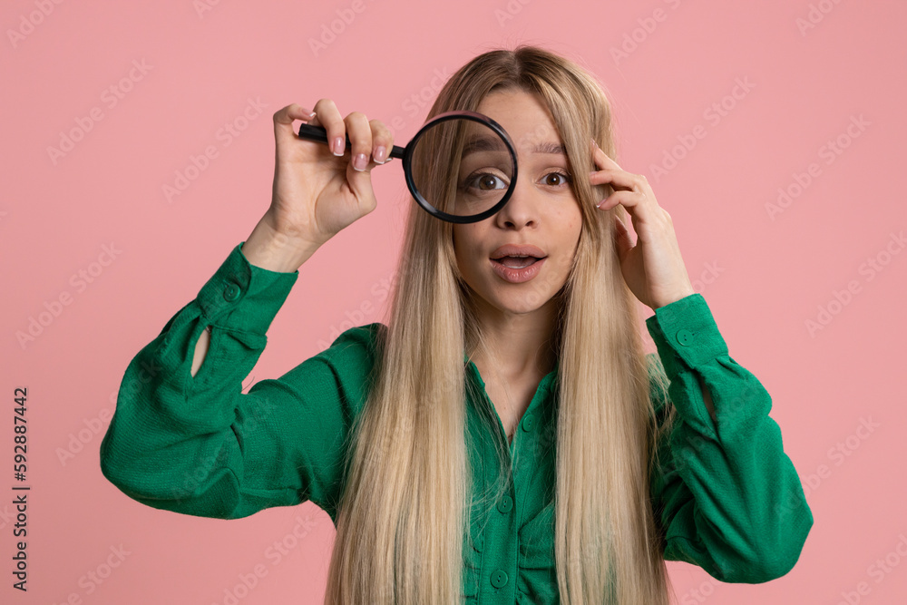 Investigator researcher scientist woman holding magnifying glass near ...