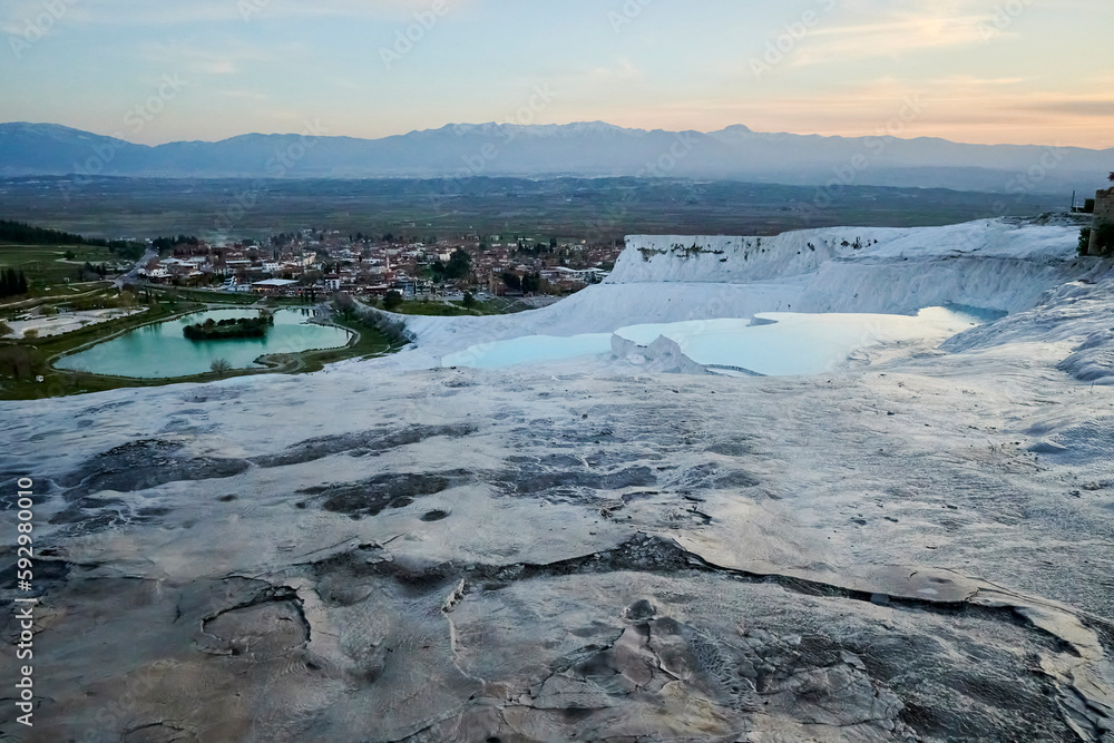 A scenic landscape of travertine pools in Pamukkale, Denizli, Turkey; a ...