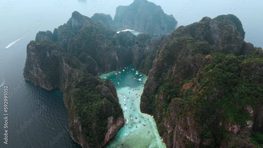 Cinematic top view the whole island of Ko Phi Phi Lee with iconic Maya ...