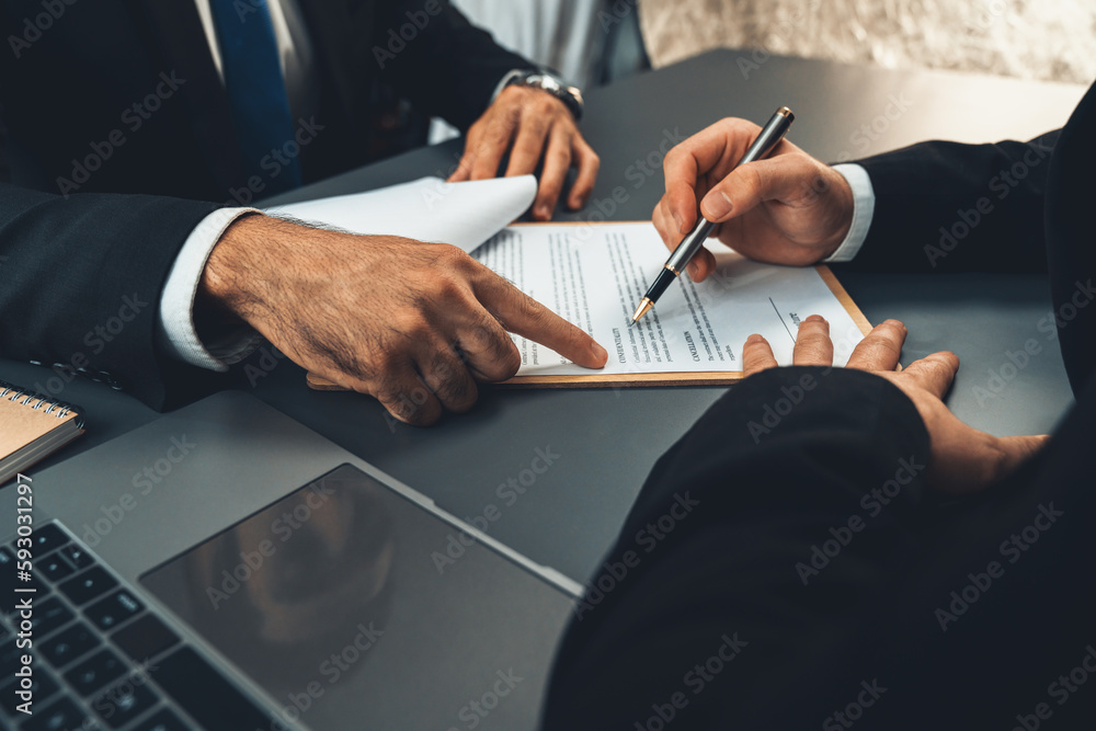 Closeup hand signing contract document with pen, sealing business deal ...