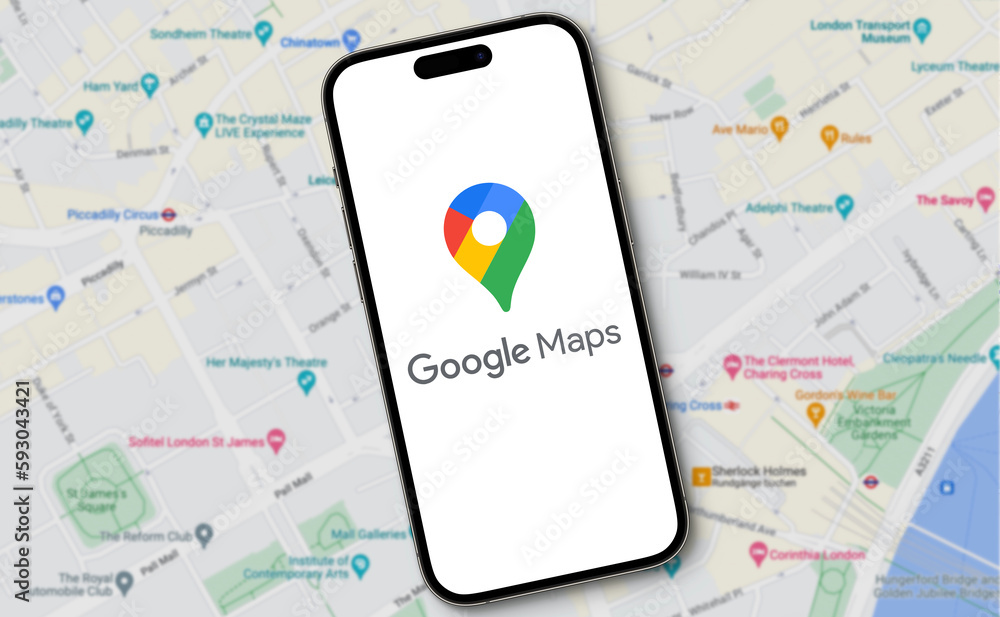 Google Maps logo with lettering is displayed on a smartphone lying on a ...