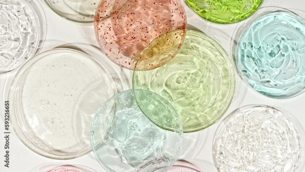 Rotation of Petri Dishes with Cosmetic Gel Fluid with Bubbles on a ...