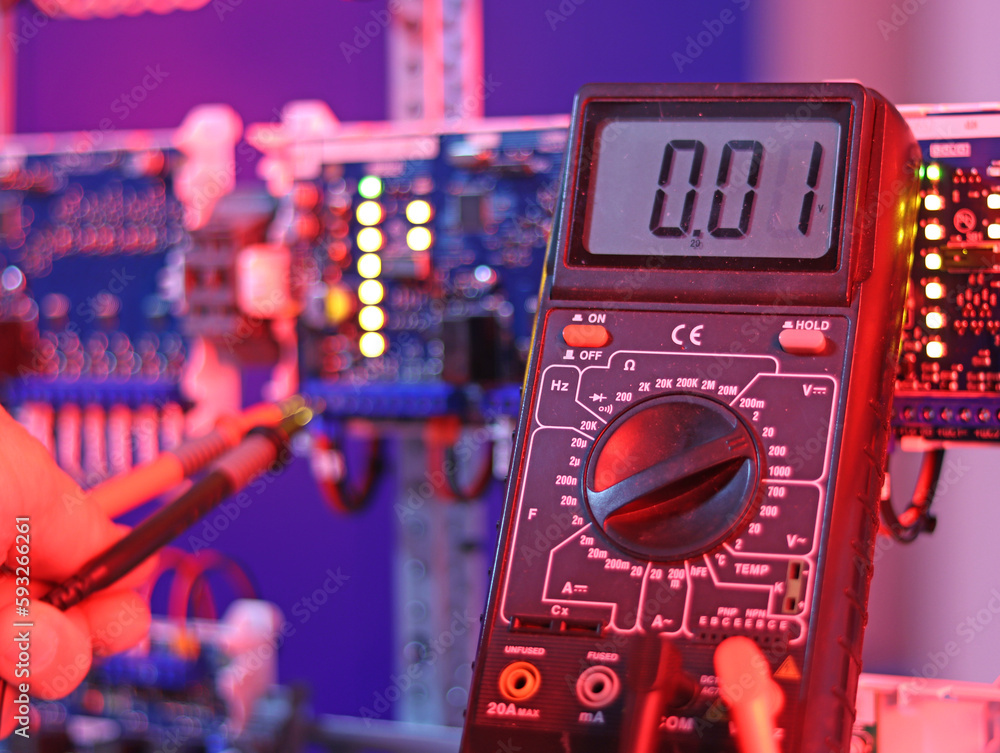 Measurement of electrical circuit parameters using a multimeter in an ...