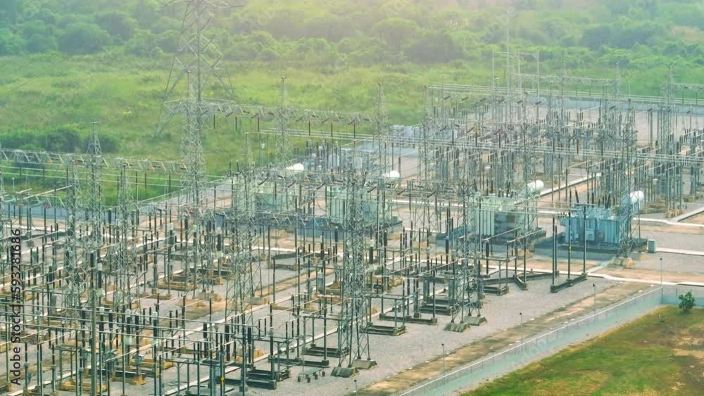 A high voltage power station, The area is usually fenced off and ...