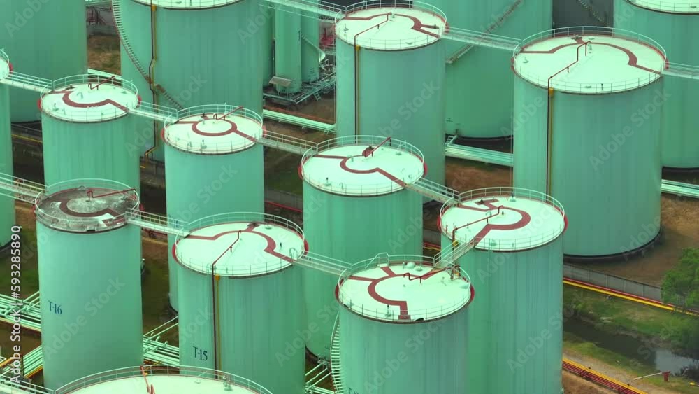 Oil depot typically appears as a sprawling complex of storage tanks ...