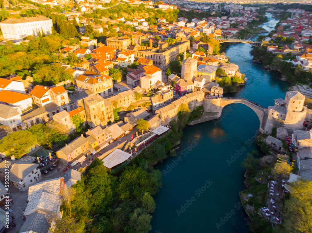 erial Mostar Bridge and Koski Mehmed Pasha Mosque drone view of the ...