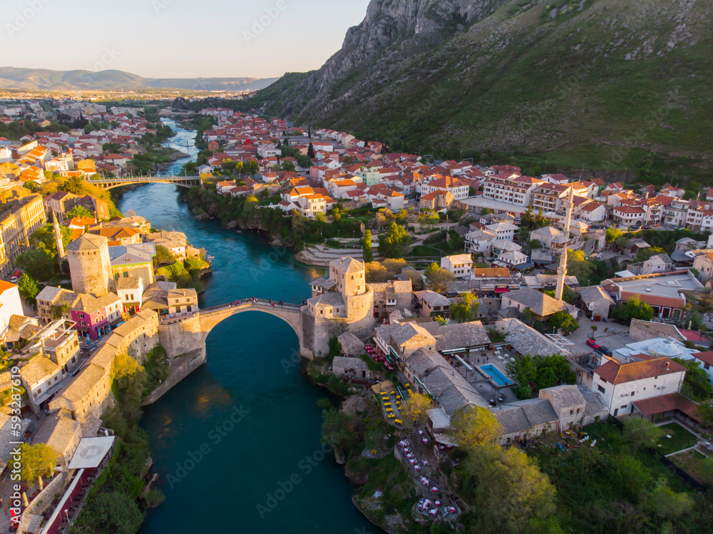 erial Mostar Bridge and Koski Mehmed Pasha Mosque drone view of the ...