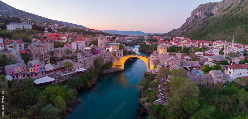 erial Mostar Bridge and Koski Mehmed Pasha Mosque drone view of the ...