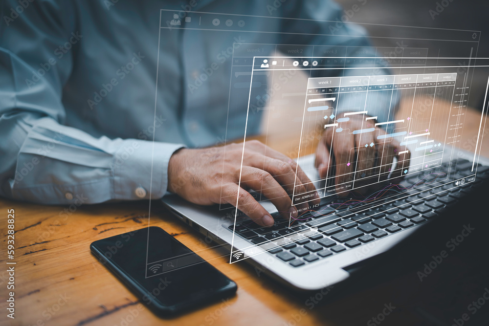 Analyst working with computer in Business Analytics and Data Management ...