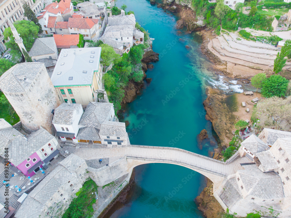 erial Mostar Bridge and Koski Mehmed Pasha Mosque drone view of the ...