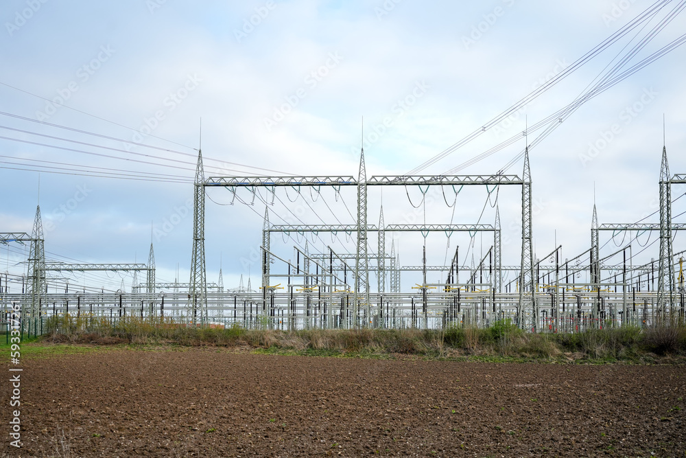 Power lines and substation, extra high voltage lines behind the ...