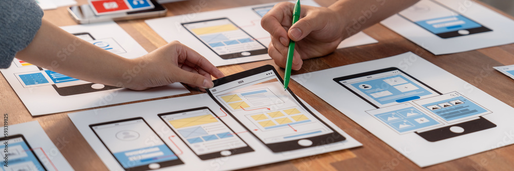 Panorama shot of front-end developer team brainstorming UI and UX ...