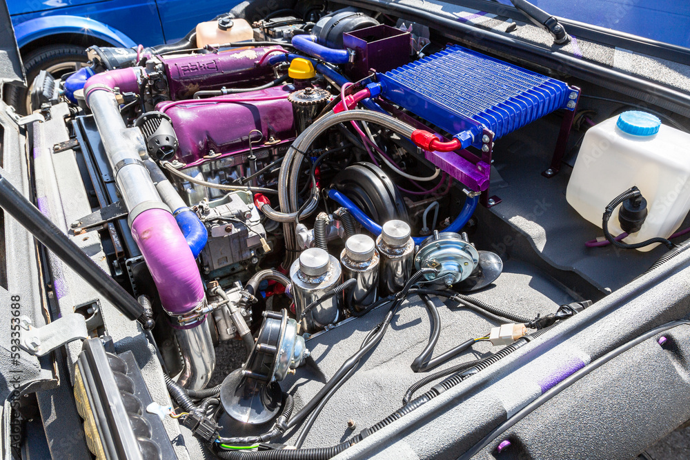 Tuned turbo car engine of Lada Niva vehicle, under the hood of a ...