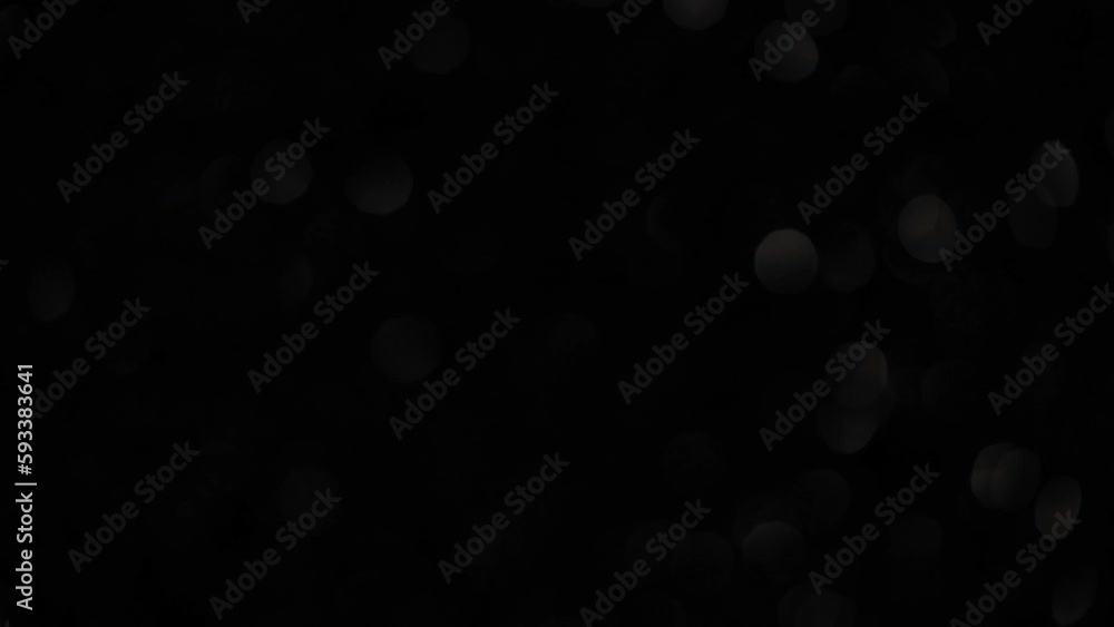 Vidéo Stock Silver Metallic Bokeh Overflow On Black Background. Motion ...