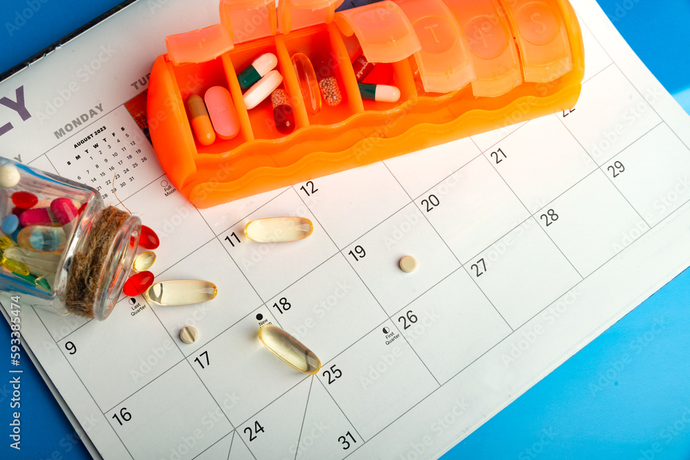 pill box or vitamin organizer with the days of the week separated ...