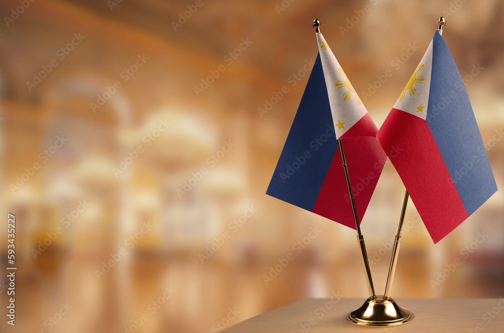 Small flags of the Philippines on an abstract blurry background Stock ...