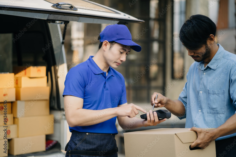 Asian delivery man, Hand using smart phone to scan QR code on tag ...