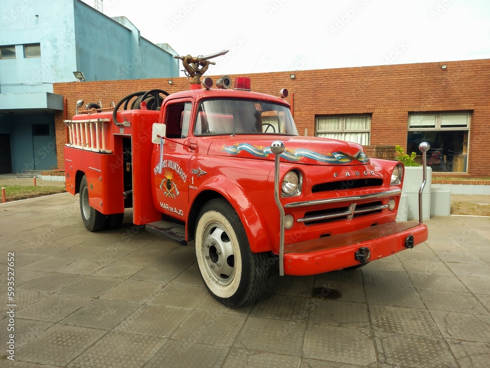Old classic red Fargo 500 fire truck pumper tanker outdoors. Stock ...