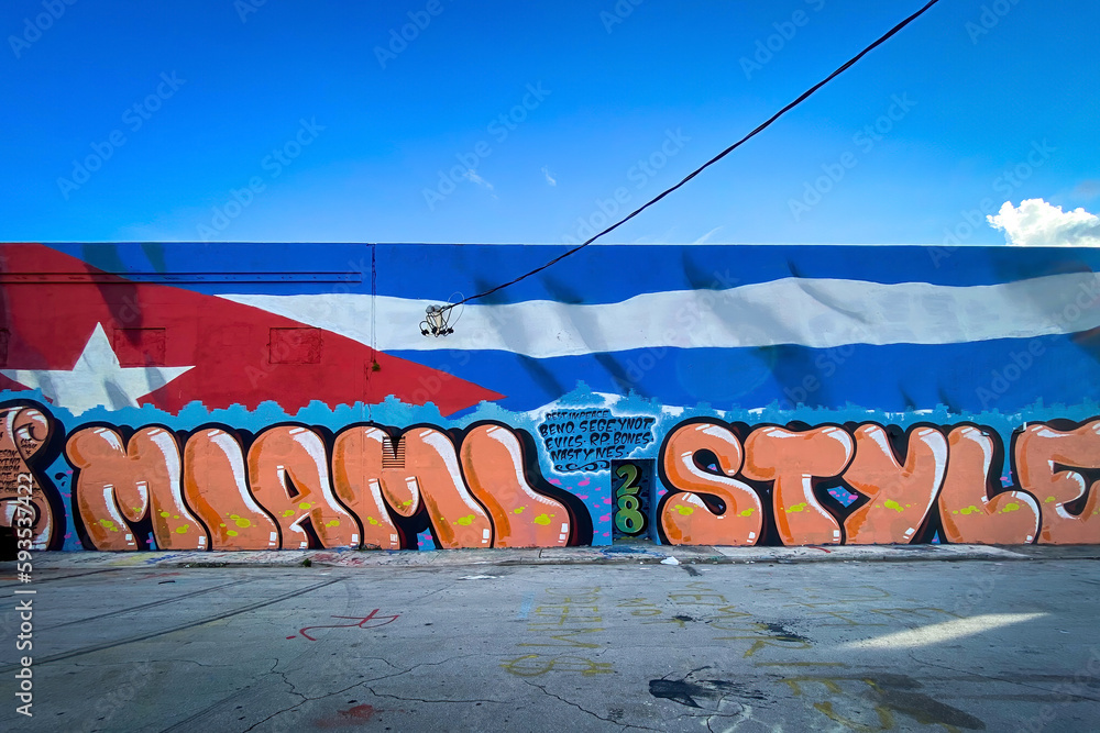 Miami, Florida, USA - November 2, 2022: Colorful graffiti art line the ...