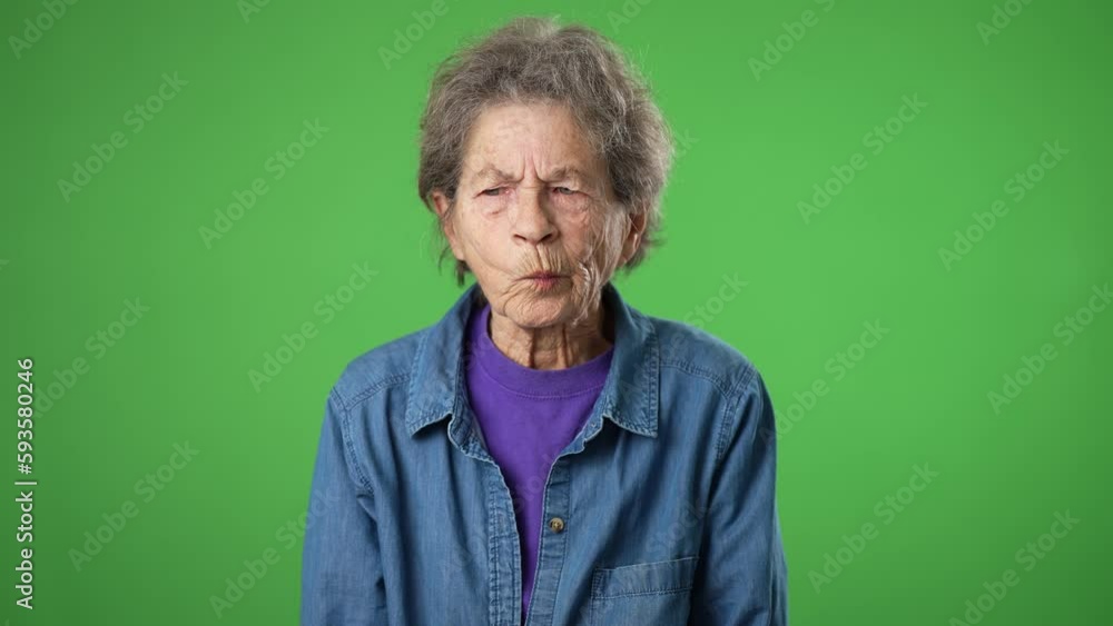 Portrait of thinking, smart puzzled pensive elderly senior old woman ...